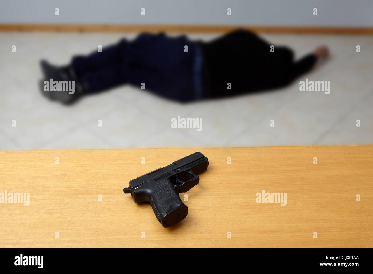Man lying dead on the floor hi-res stock photography and images - Alamy