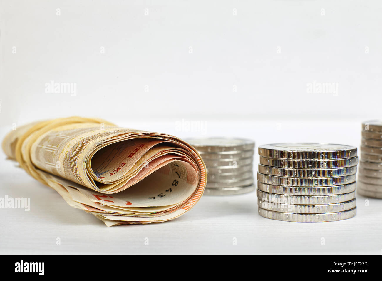 Euro coin roll hi-res stock photography and images - Alamy
