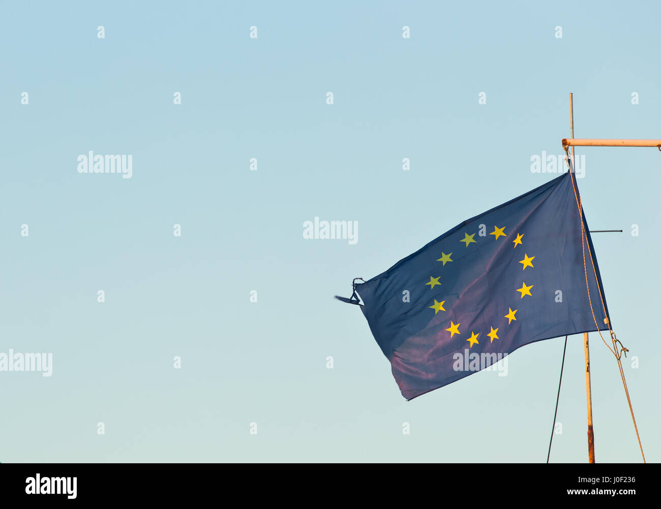Torn European Union flag Stock Photo - Alamy
