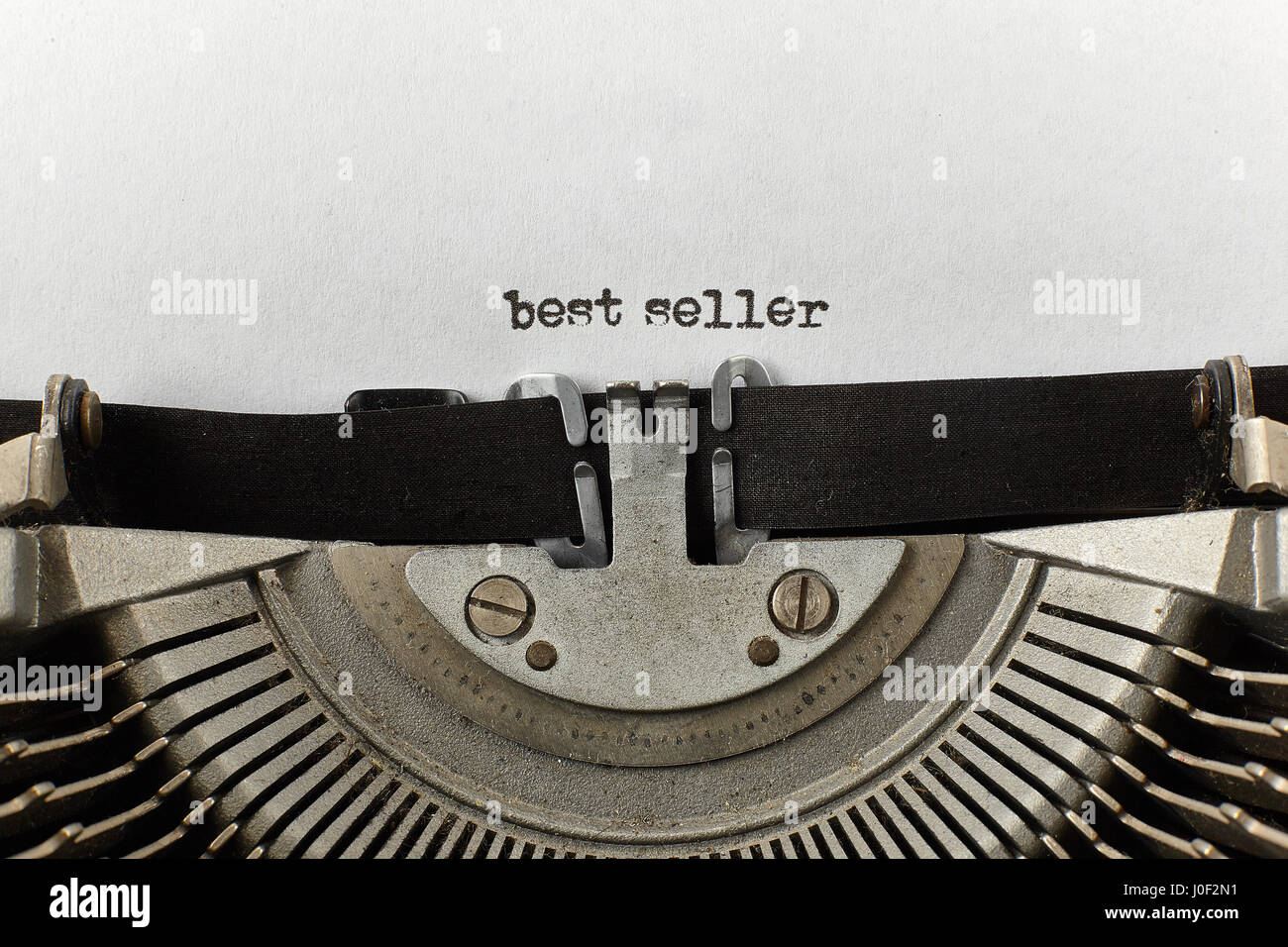 best seller typed words on a vintage typewriter Stock Photo - Alamy