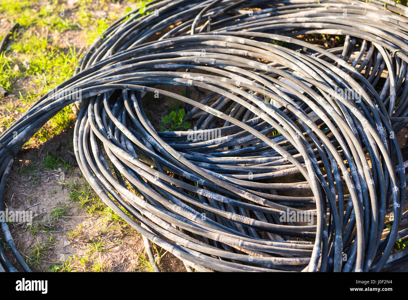 Garden hose-pipe outdoor Stock Photo - Alamy