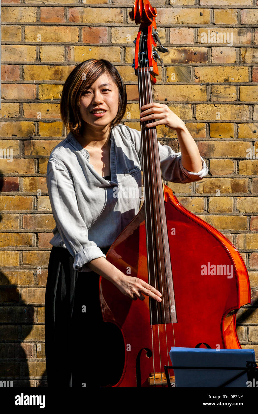 Female busker hi-res stock photography and images - Alamy