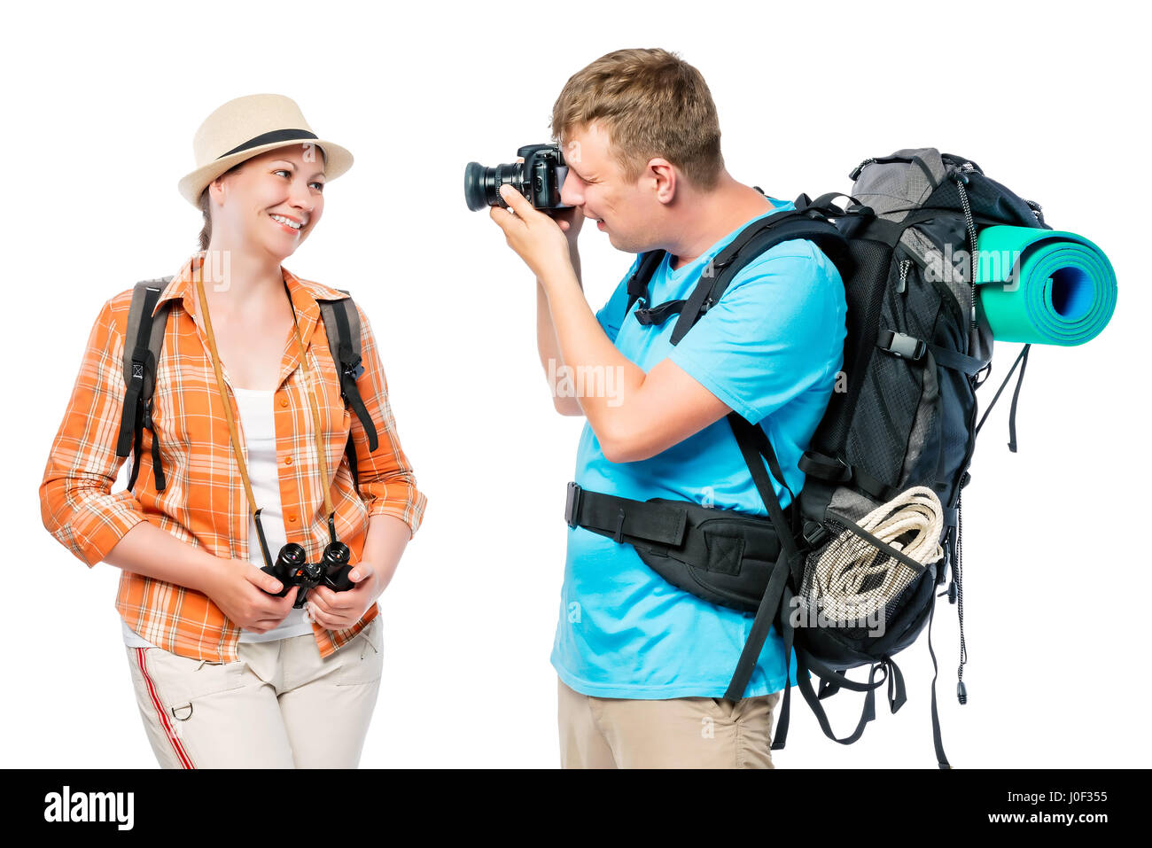 Girl model posing for traveler with camera on white background Stock ...
