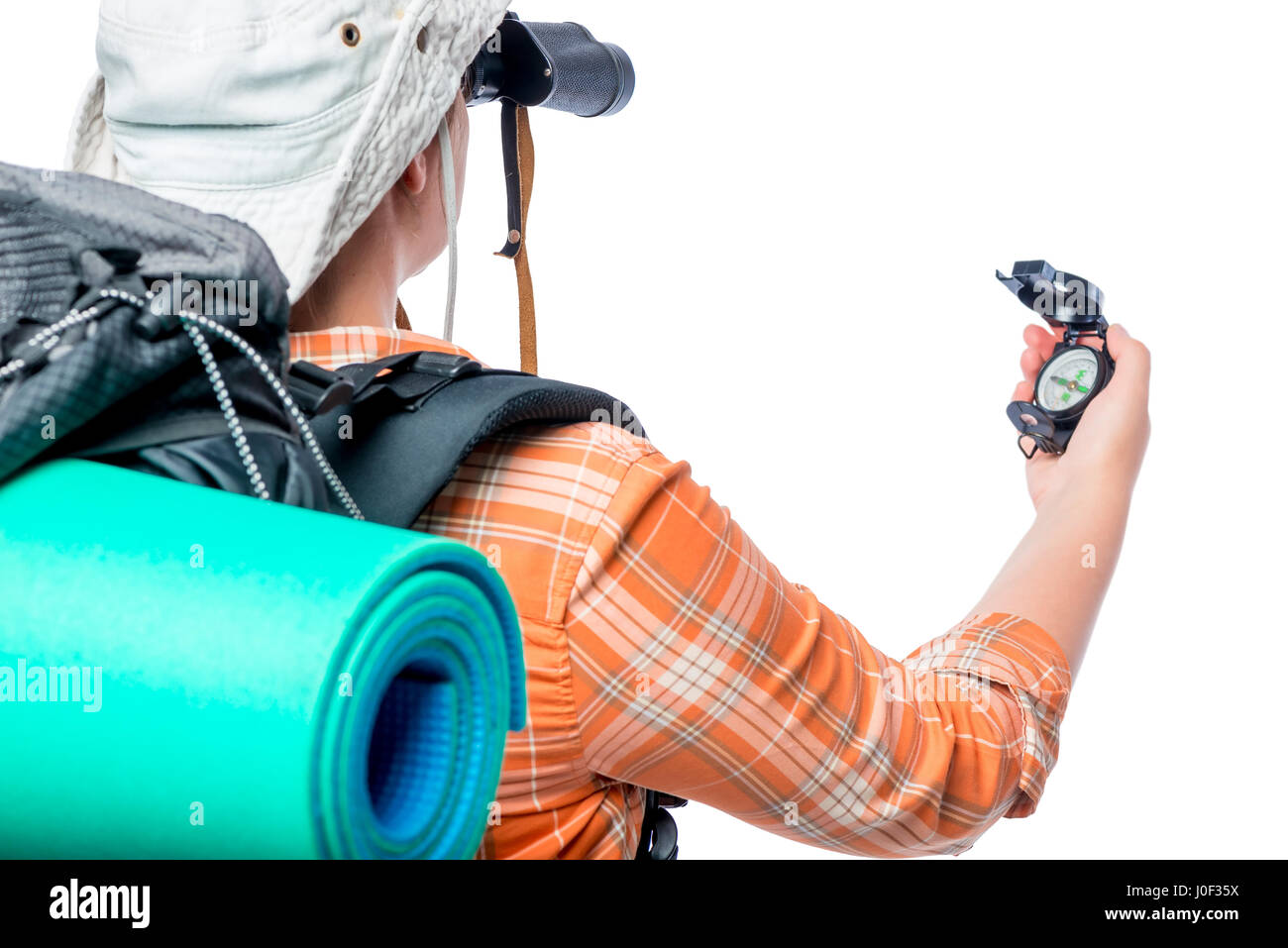 Lost tourist with a compass hand on a white background Stock Photo - Alamy
