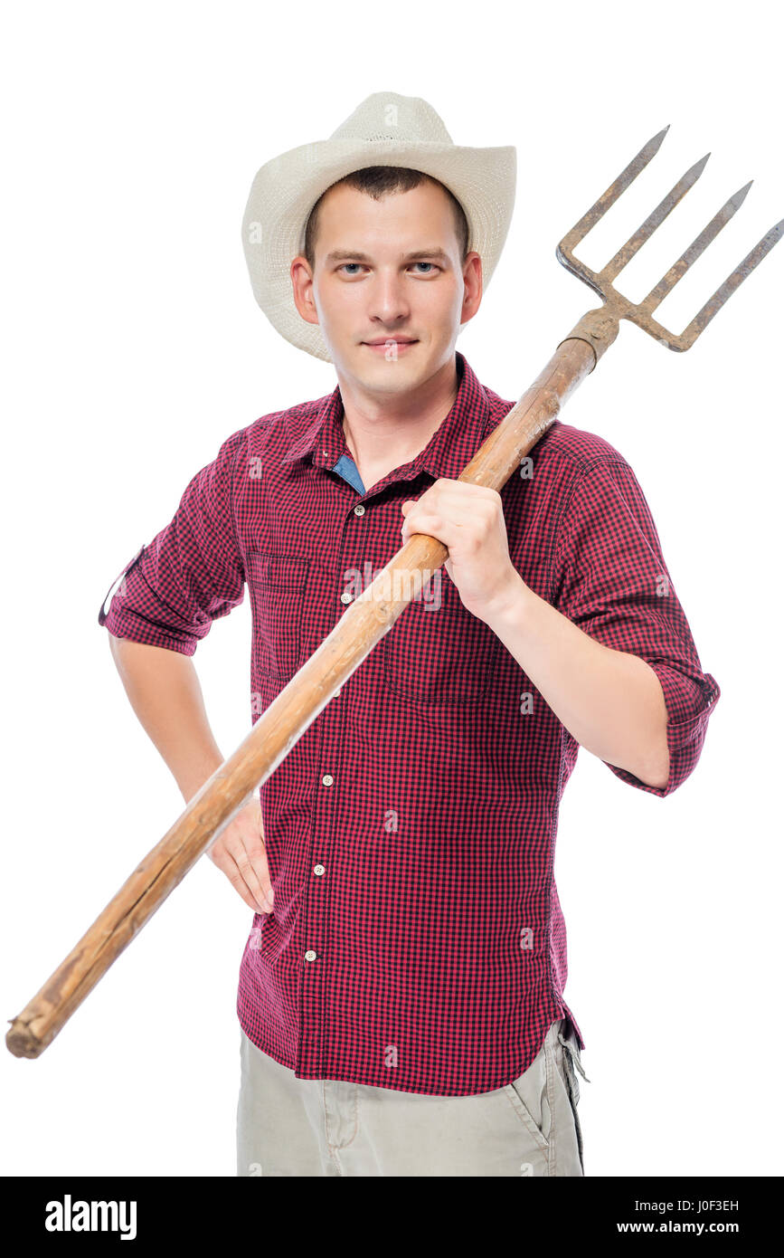 Vertical portrait of a farmer on a white background with a pitchfork ...