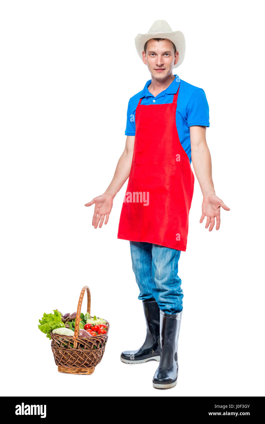 Farmer in apron posing on white background Stock Photo - Alamy
