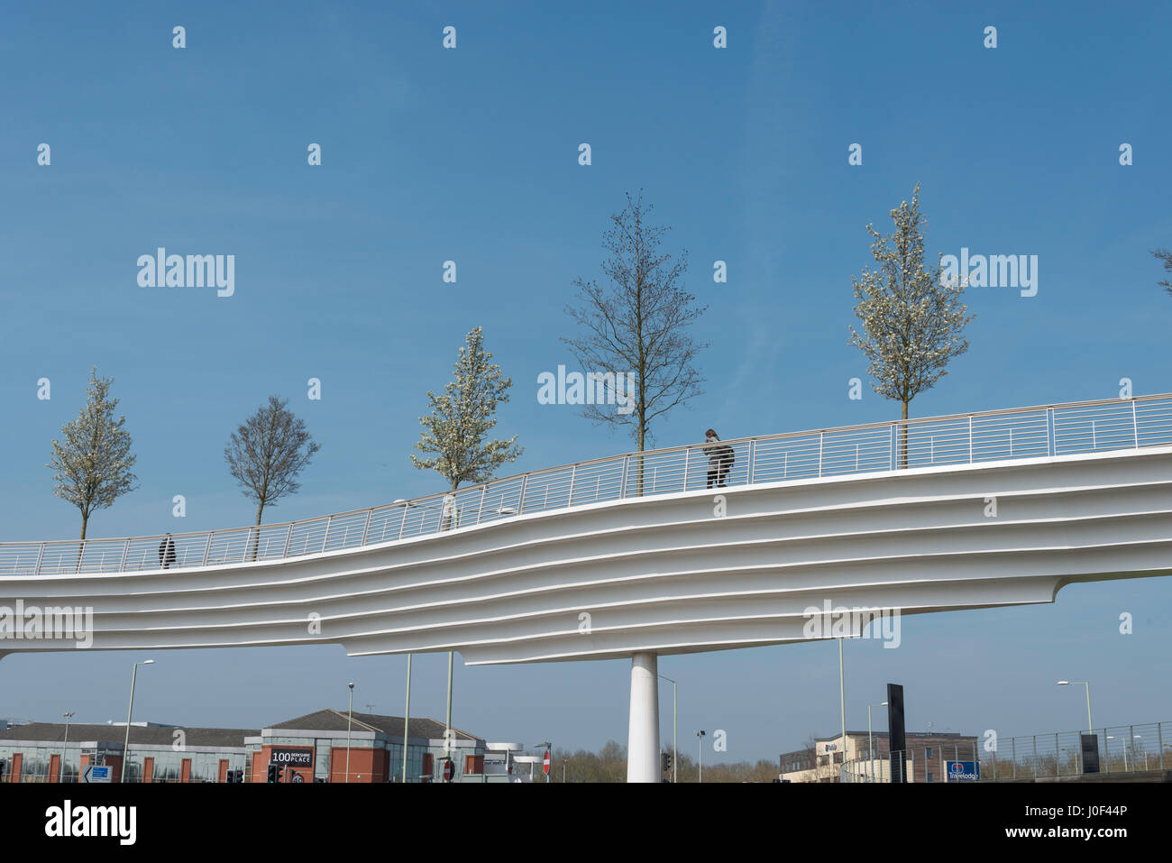 Modern pedestrian bridge over Wharfedale Road (A329), Winnersh Triangle ...