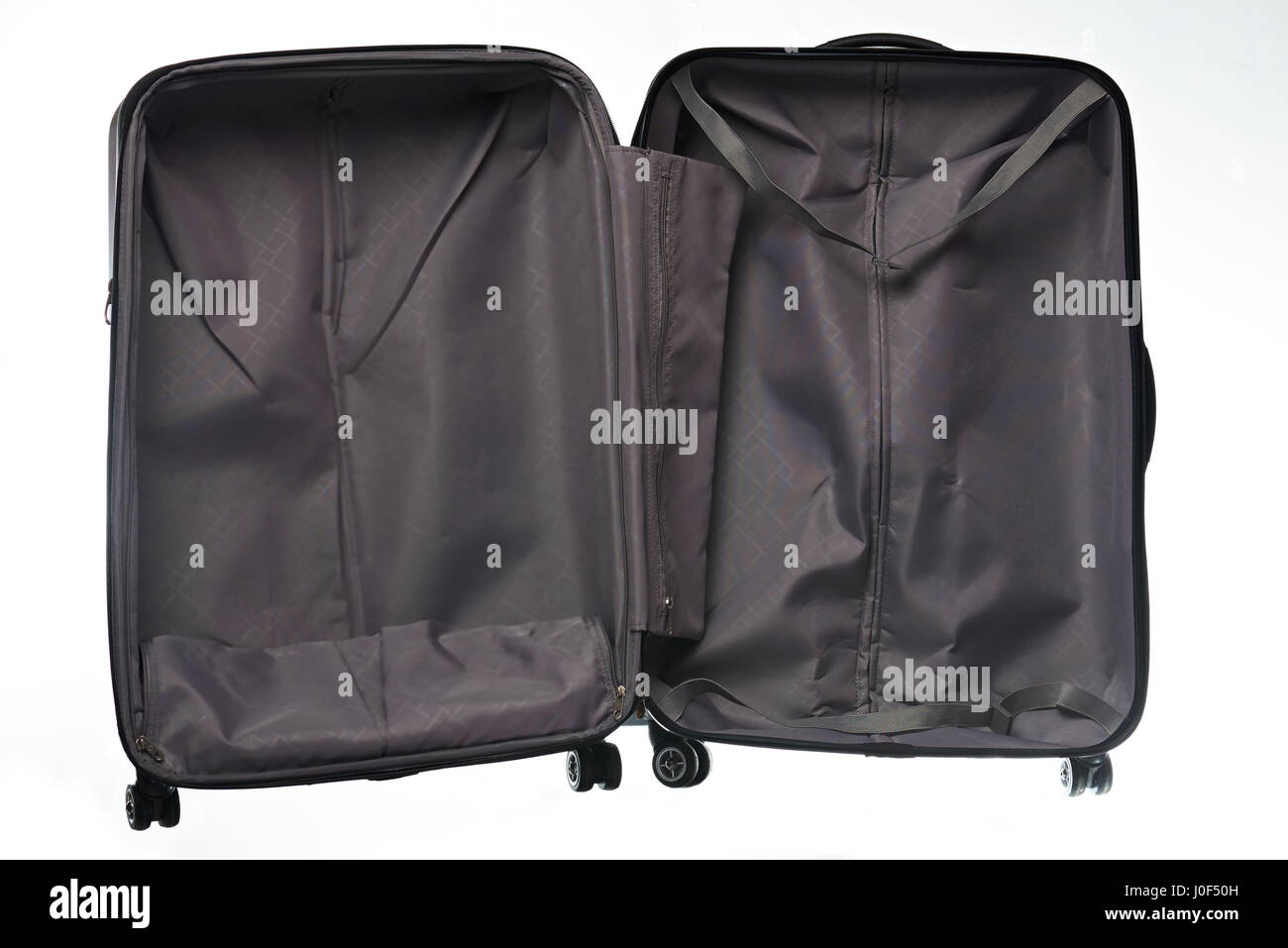 One open empty suitcase isolated on white background Stock Photo - Alamy