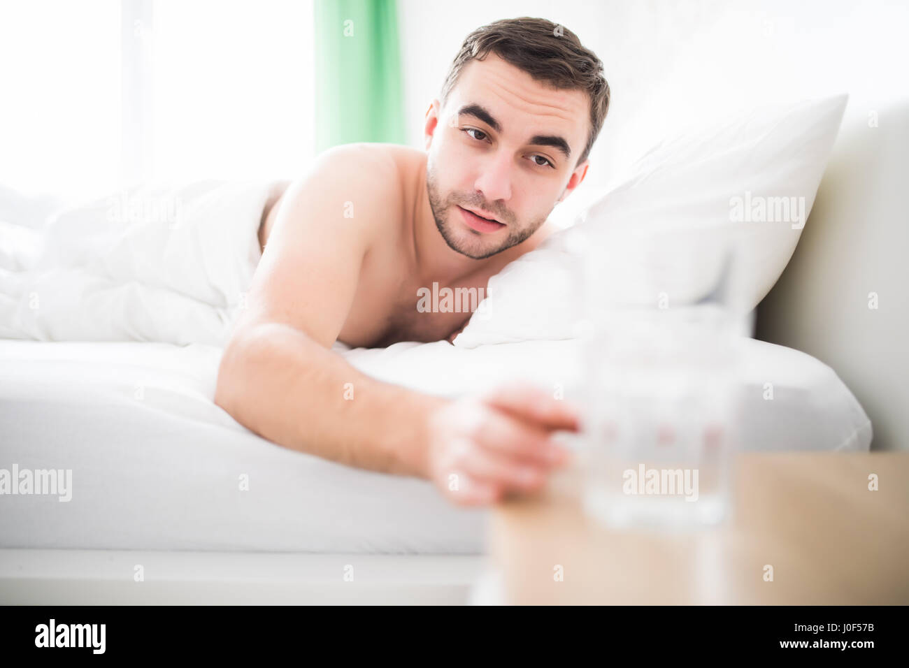 Old man sitting up in bed hi-res stock photography and images - Alamy