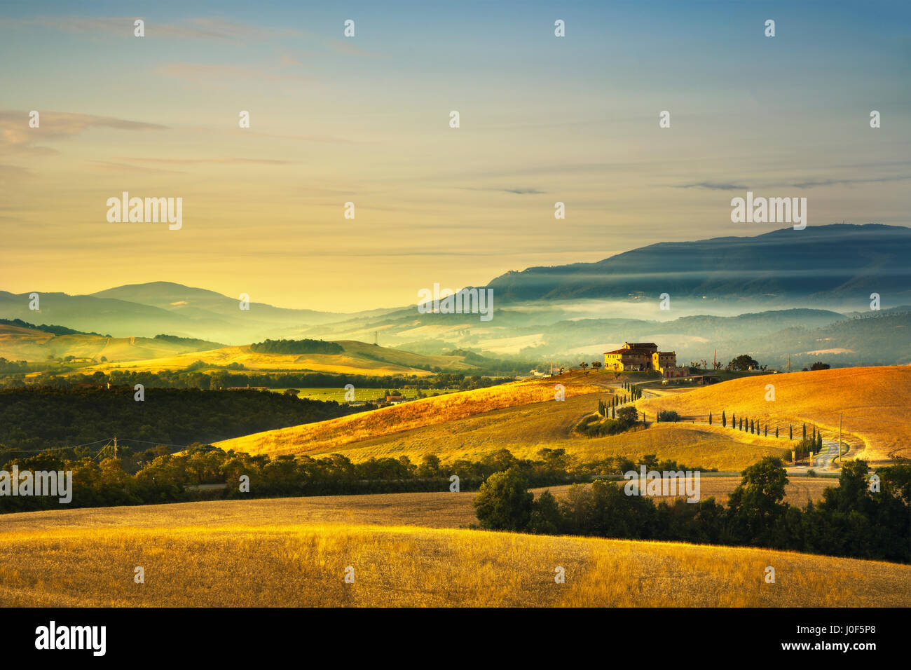 Tuscany spring, rolling hills on sunset. Rural landscape. Green fields ...