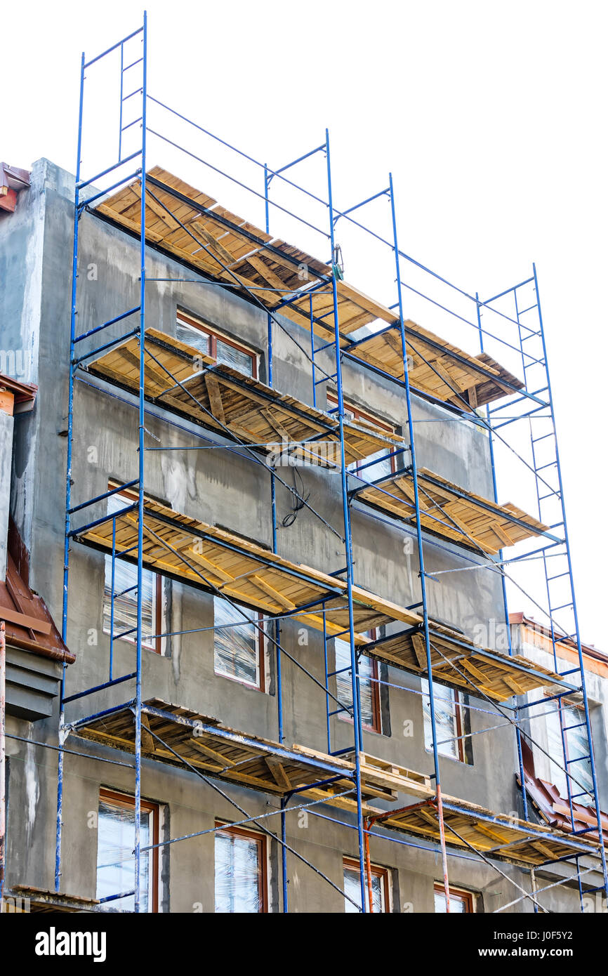 construction site. scaffolding platforms for work on a new apartment ...