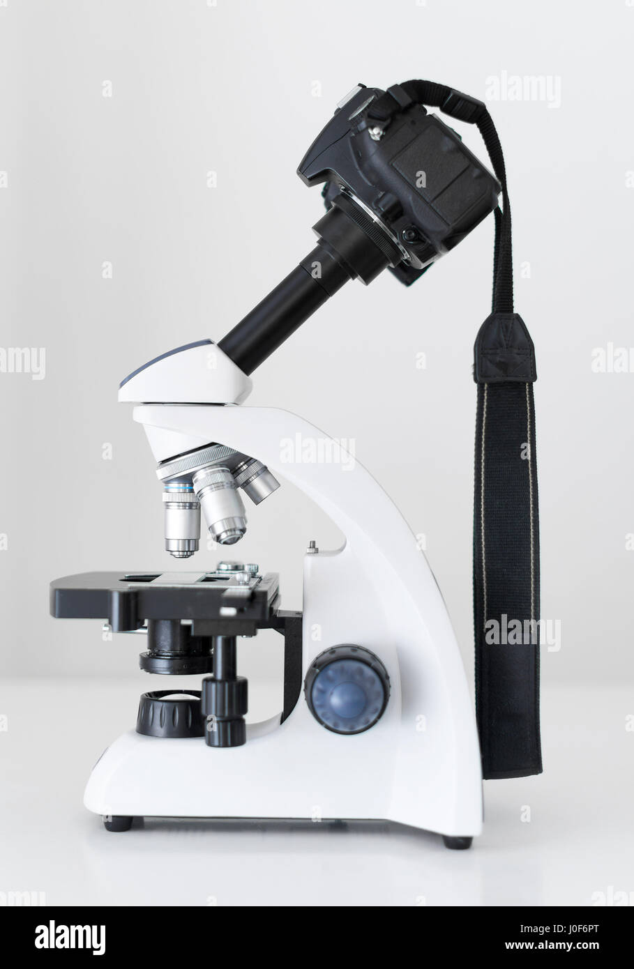 DSLR Camera attached with adapter to microscope Stock Photo - Alamy
