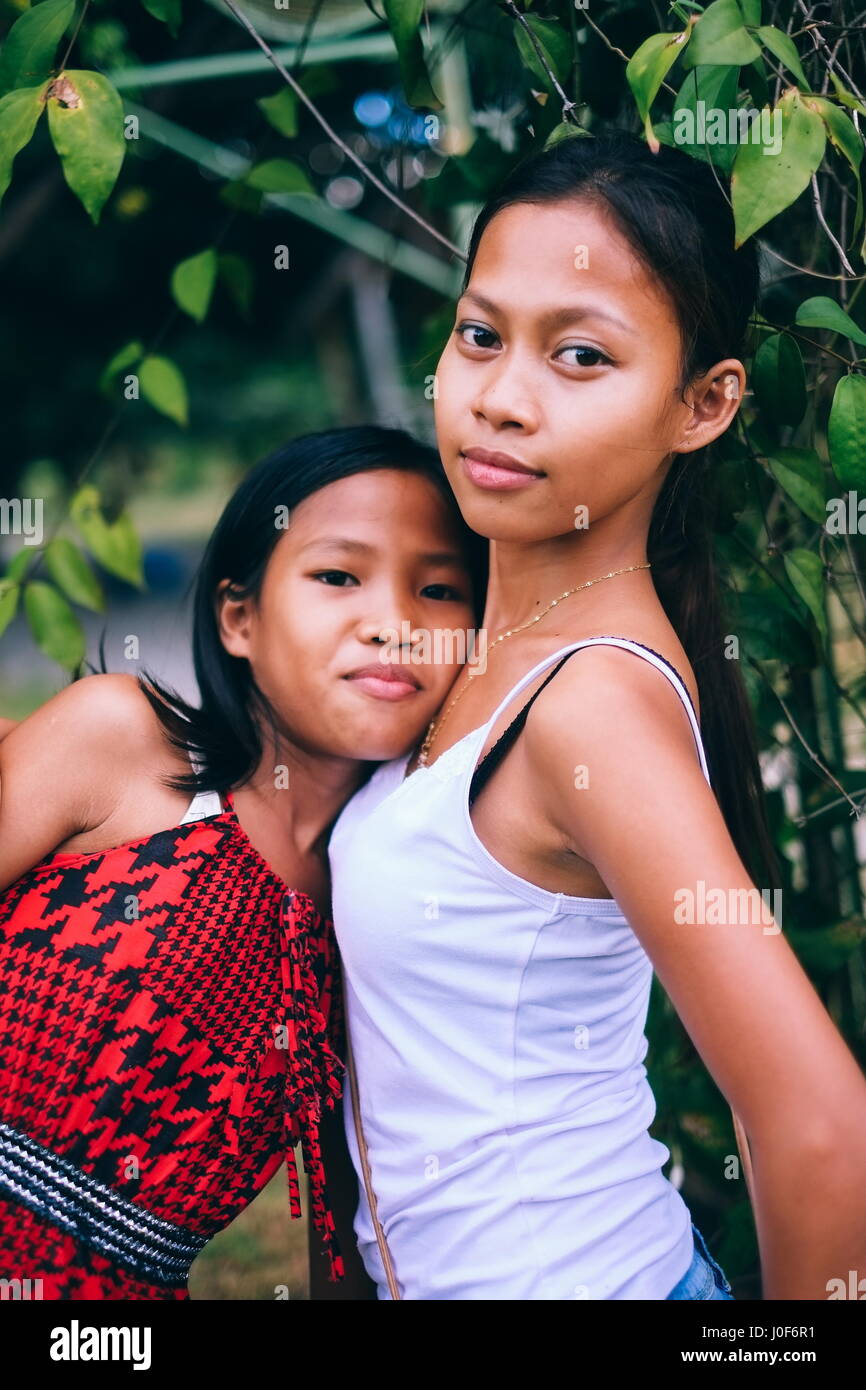 Native Asian people, sisters portrait in the farm Stock Photo - Alamy