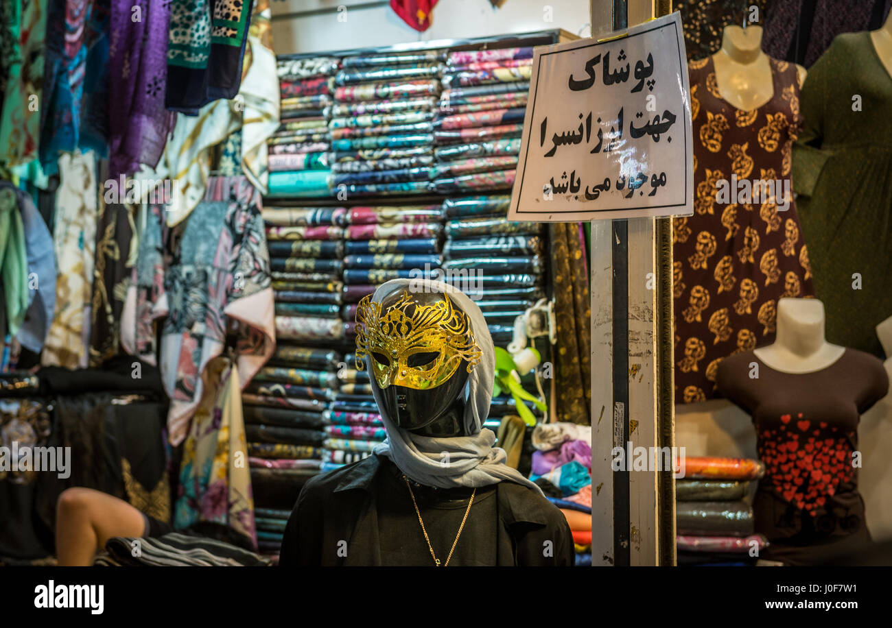 Clothes and fabrics stand on the Grand Bazaar in Tehran city, capital ...