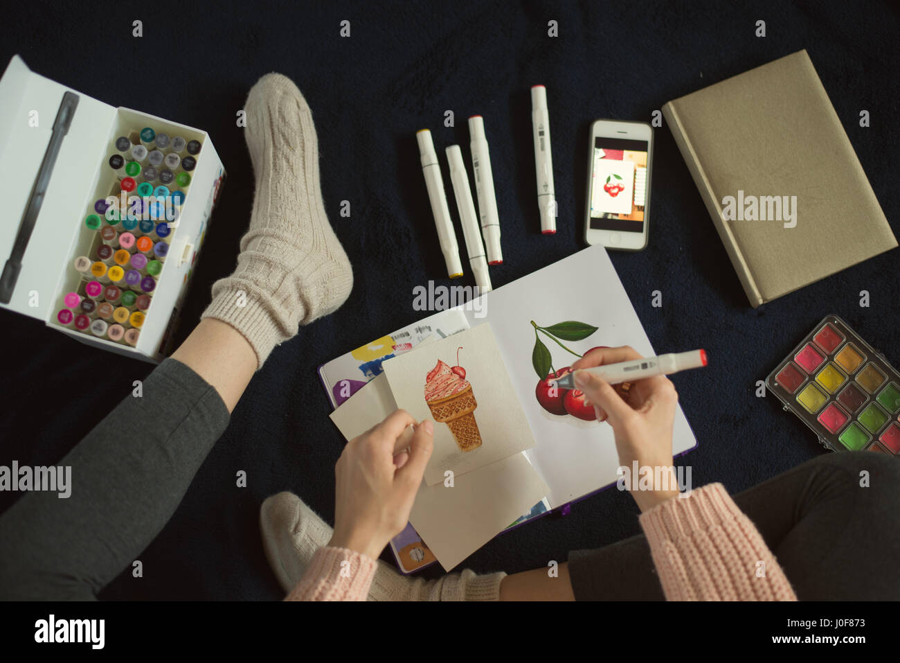 artist using artistic markers. realism painting Stock Photo - Alamy