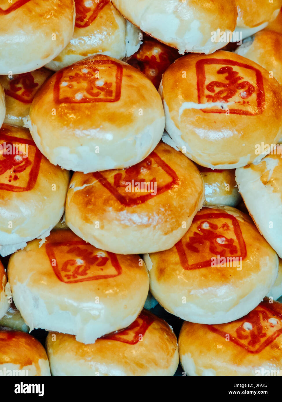 Chinese pastry, traditional bread in china town selling on the street ...