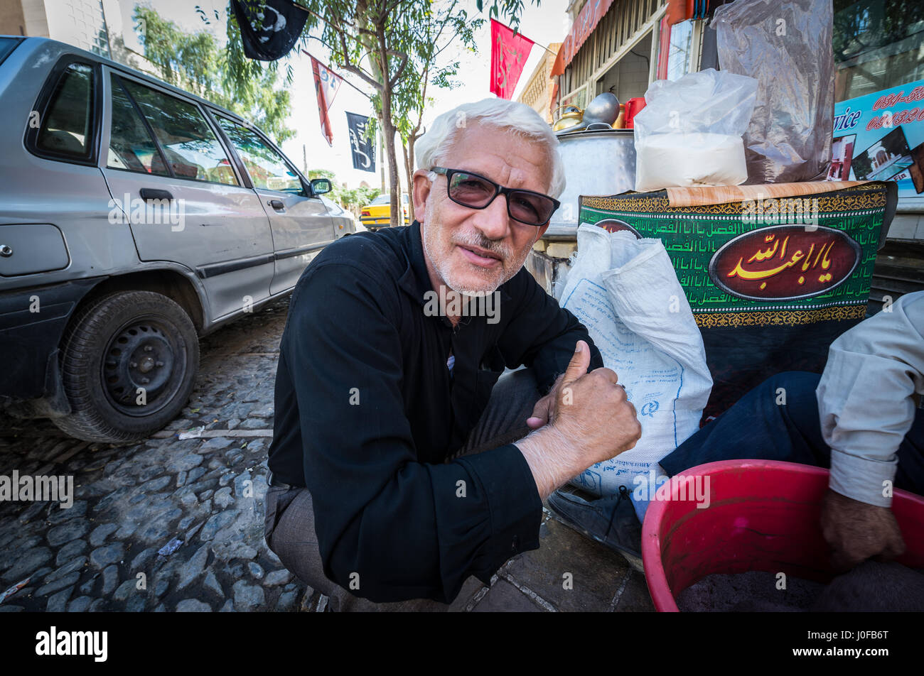 Iranian man posing for photo on a street in Kashan city, capital of ...