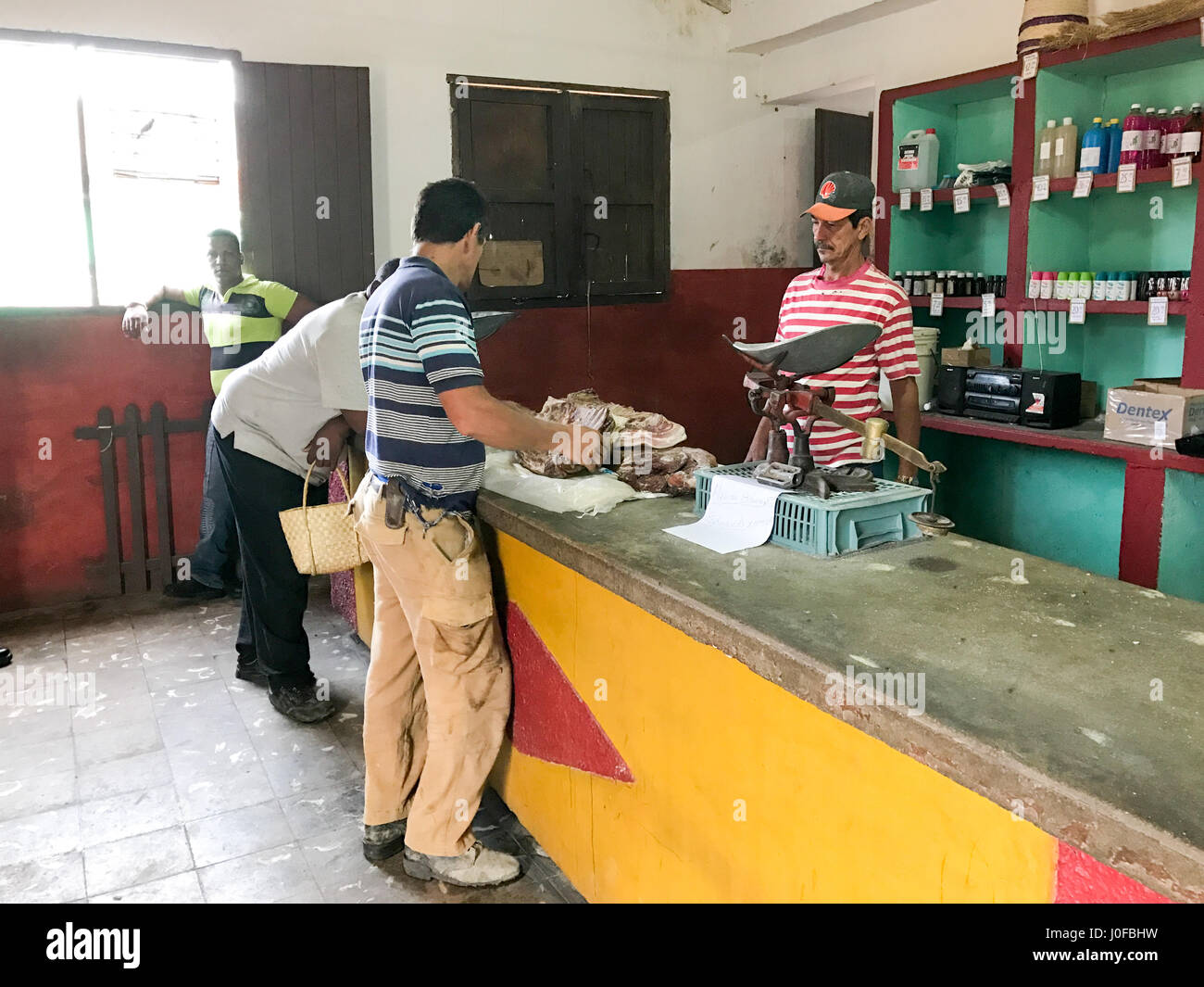 Trinidad, Cuba - January 12, 2017: Buying meat in a shop on the streets ...