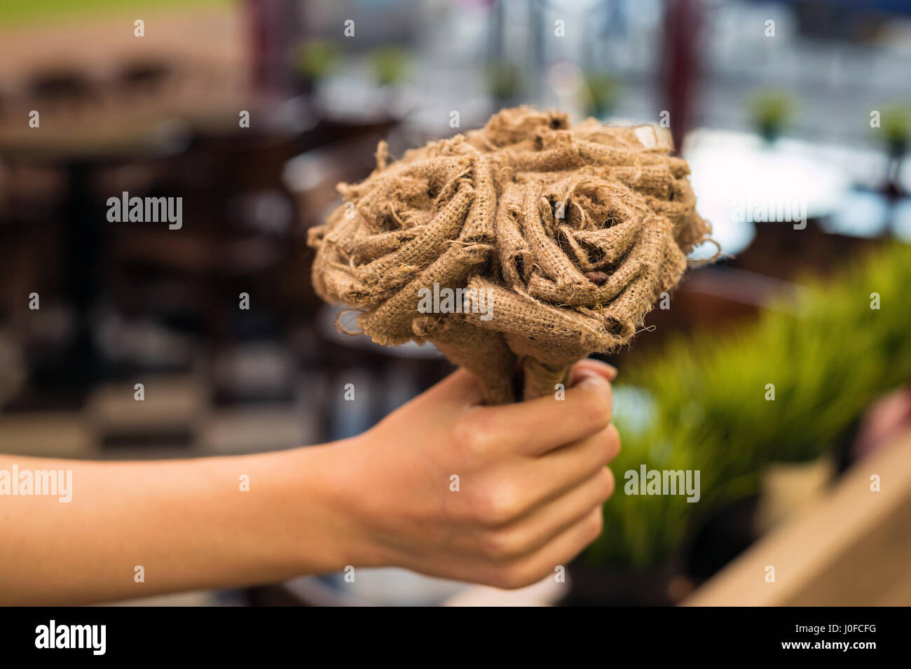 Bouquet of artificial beautiful grey roses made of burlap Stock Photo ...