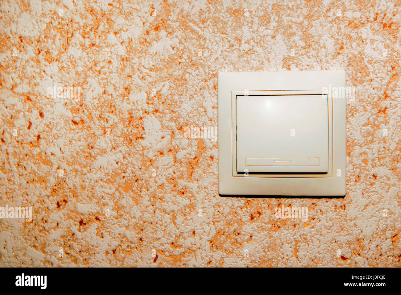 Electrical beige rocker light switch on wall Stock Photo - Alamy
