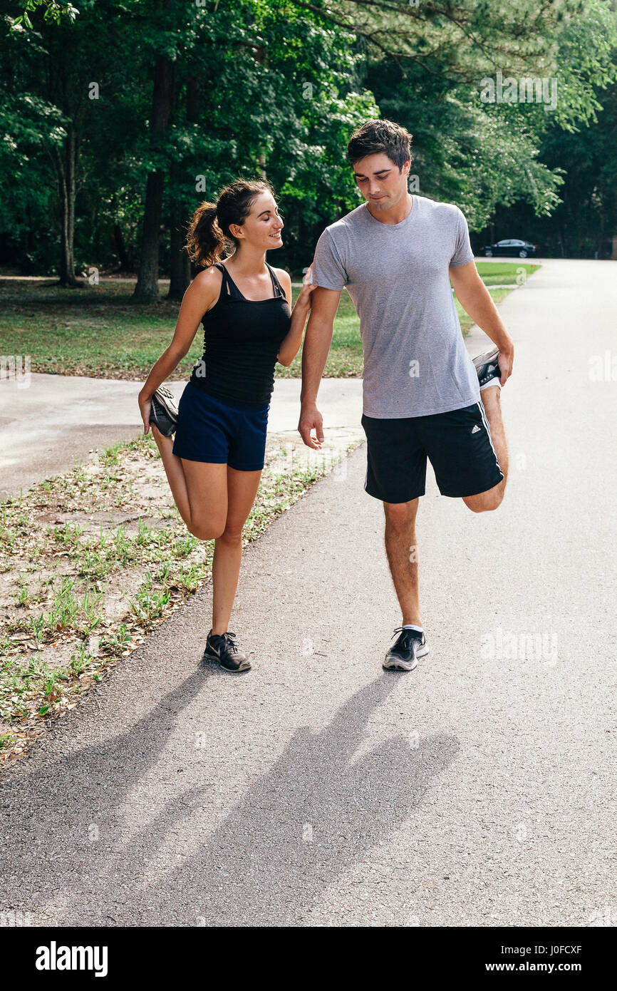 Athletic Couple Running Stock Photo - Alamy