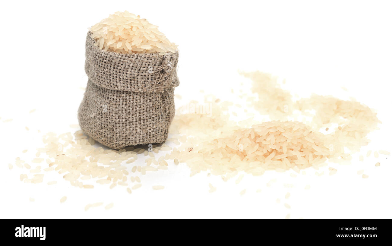 rice in sack isolated on white background Stock Photo - Alamy