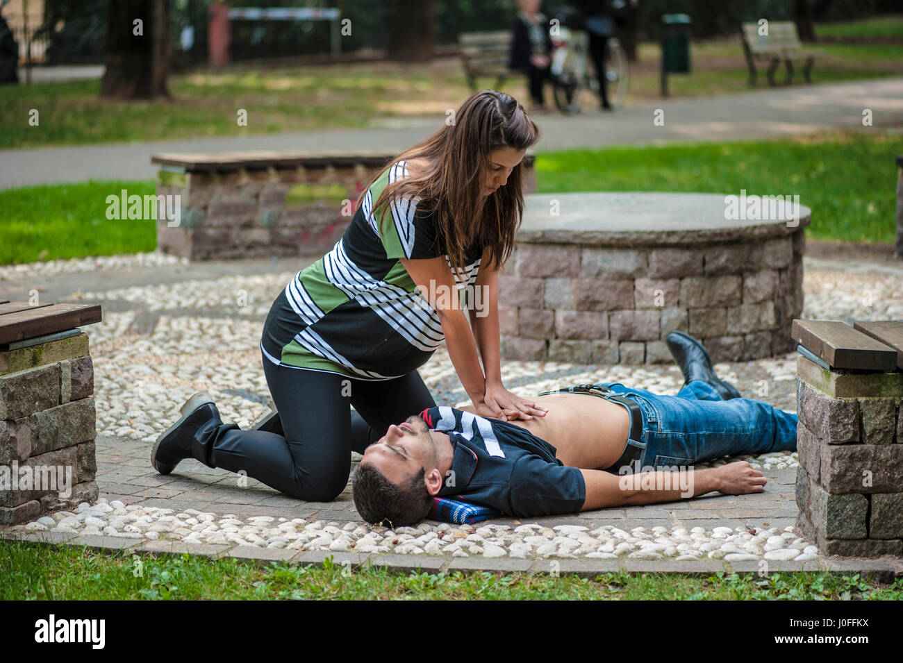 Emergency in the park Stock Photo - Alamy