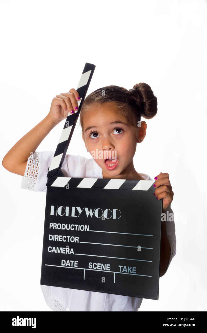 young girl modeling in studio with production slate Stock Photo - Alamy