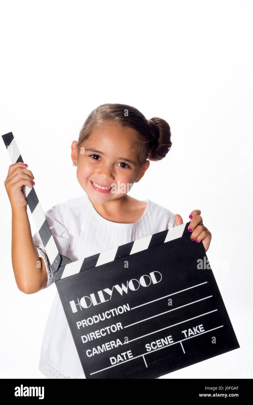 young girl modeling in studio with production slate Stock Photo - Alamy