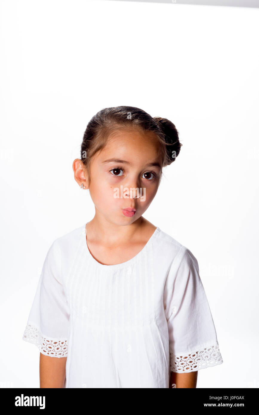 young girl modeling in studio looking at camera Stock Photo - Alamy