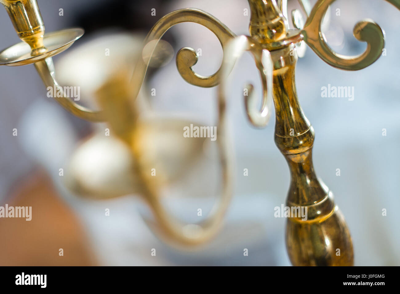 A close up of a golden candelabra Stock Photo - Alamy