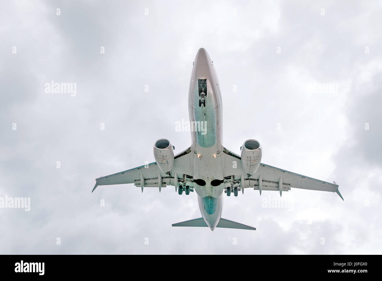 Jet airplane preparing for landing Stock Photo - Alamy