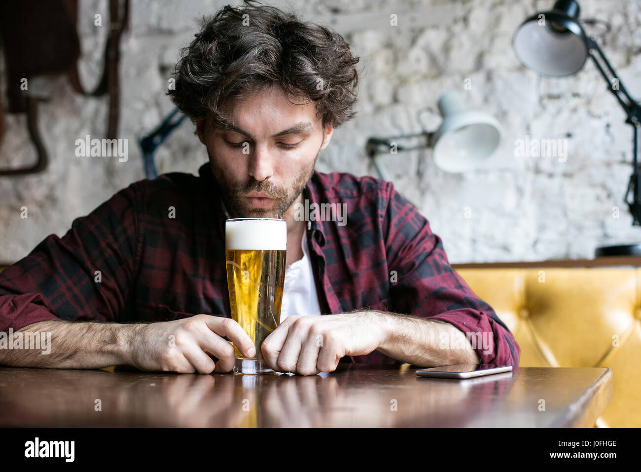 Man alone in pub hi-res stock photography and images - Alamy