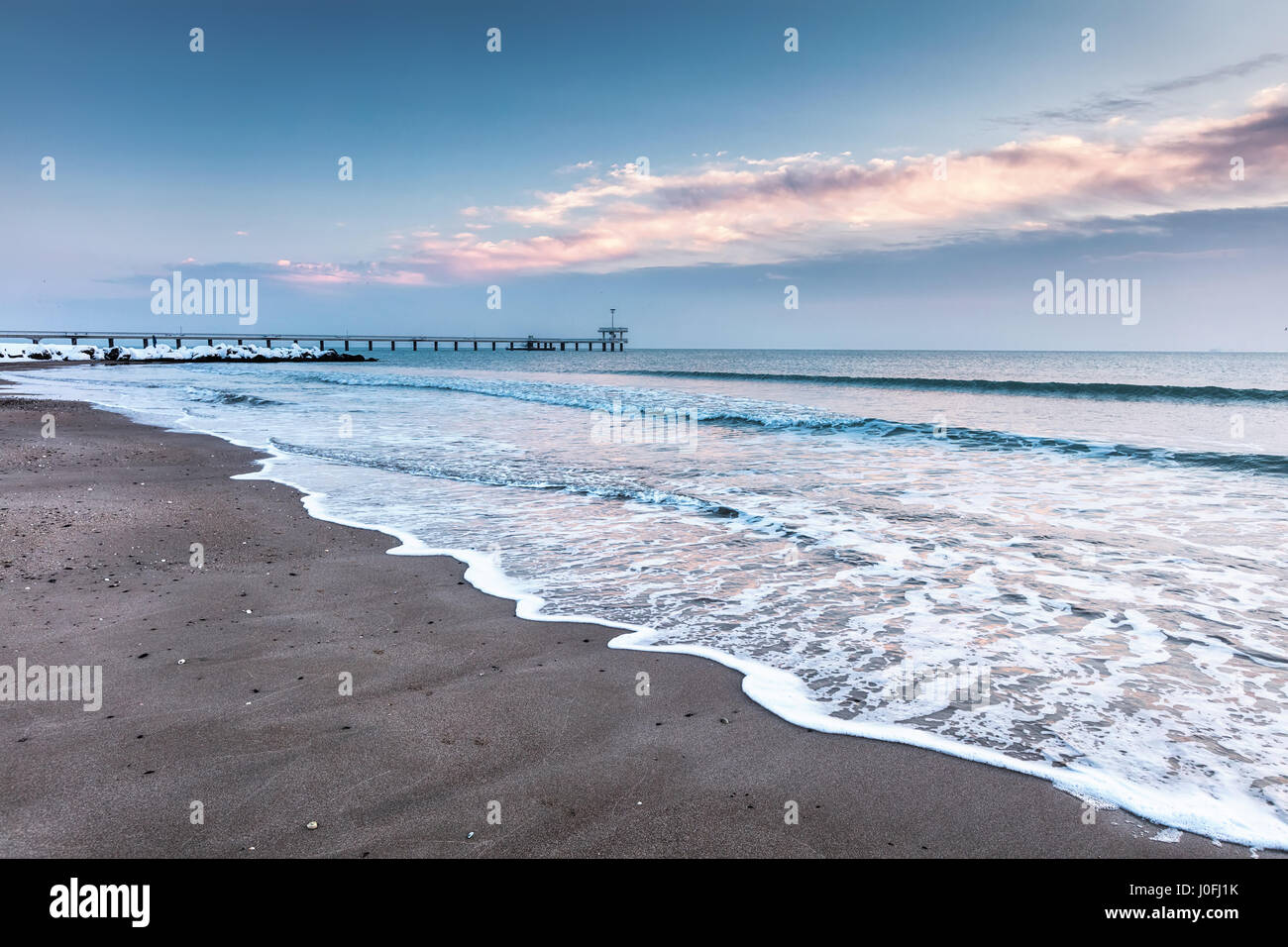 Snowy winter morning by the sea shore Stock Photo - Alamy