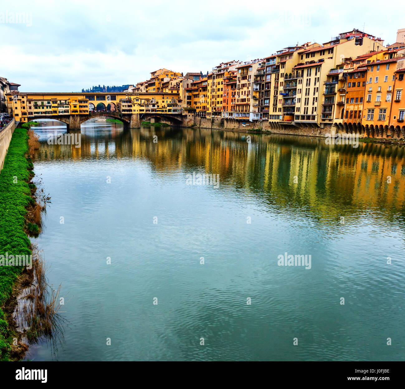 Florence on the banks of Arno with the Ponte Vecchio (Old Bridge) in ...