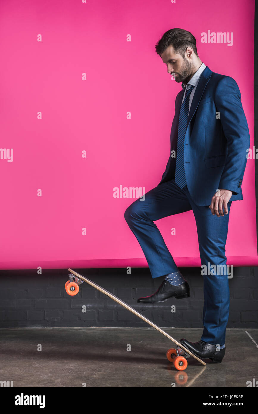 Man Standing Up In Suit