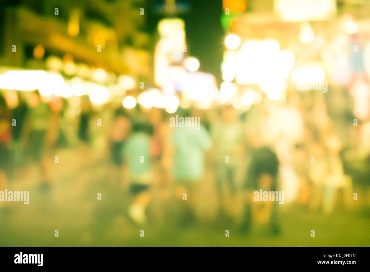 Blurred image of busy night life in the city Stock Photo - Alamy