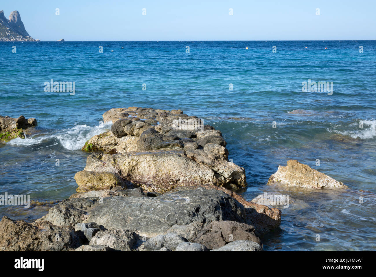 Stone Jetty at Hort Cove and Beach; Ibiza, Spain Stock Photo - Alamy