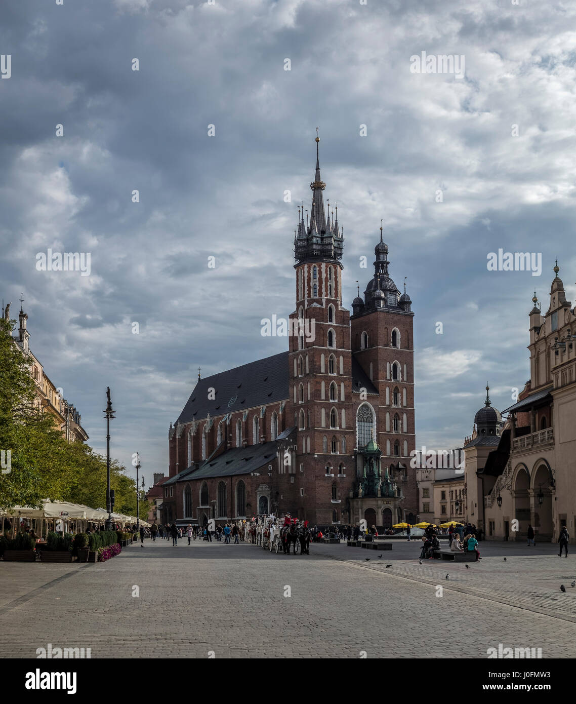 Main square and St Mary's Basilica church in Krakow Poland Stock Photo ...