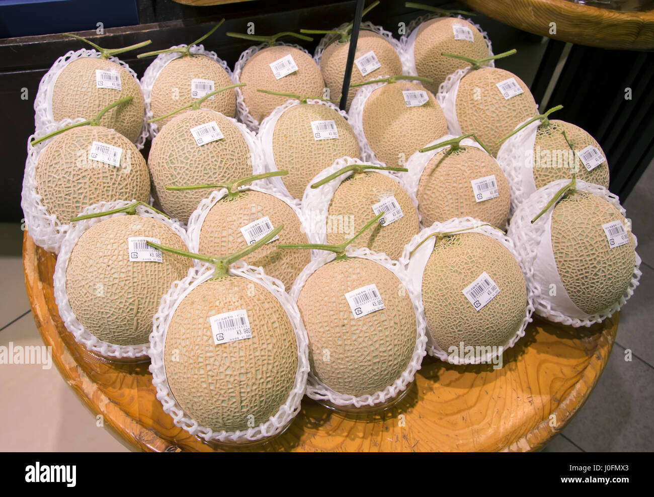 Perfect ripe melons at the fine shop. It’s a customary in Japan to give ...