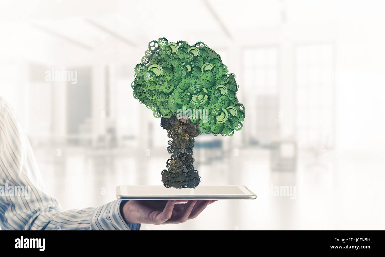 Eco green environment concept presented by tree as working mecha Stock ...