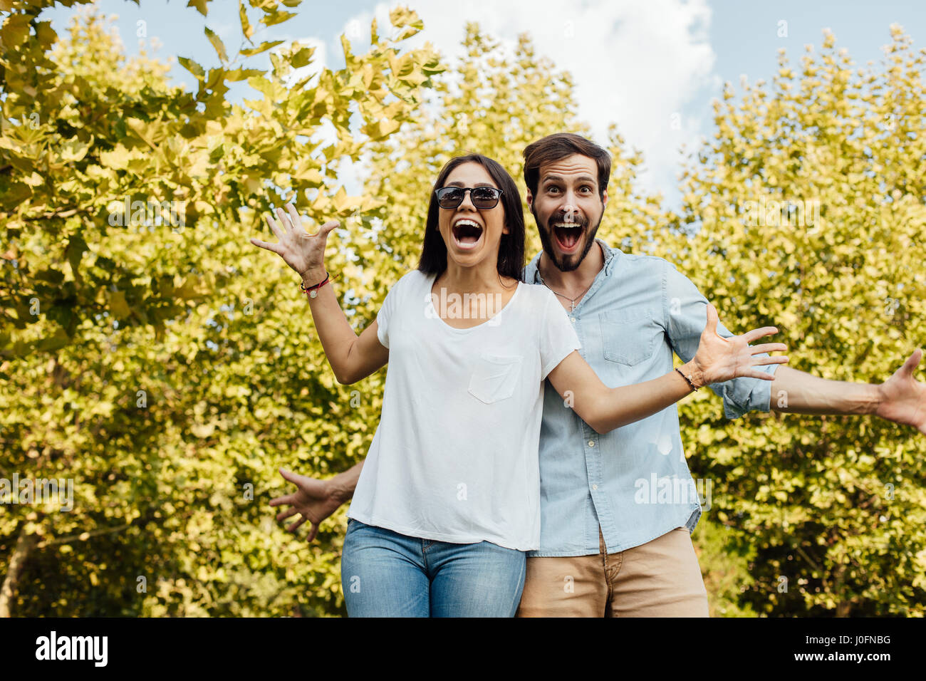 Suprised happy couple hi-res stock photography and images - Alamy