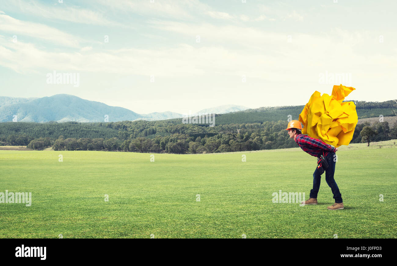 Engineer man carry load Stock Photo - Alamy