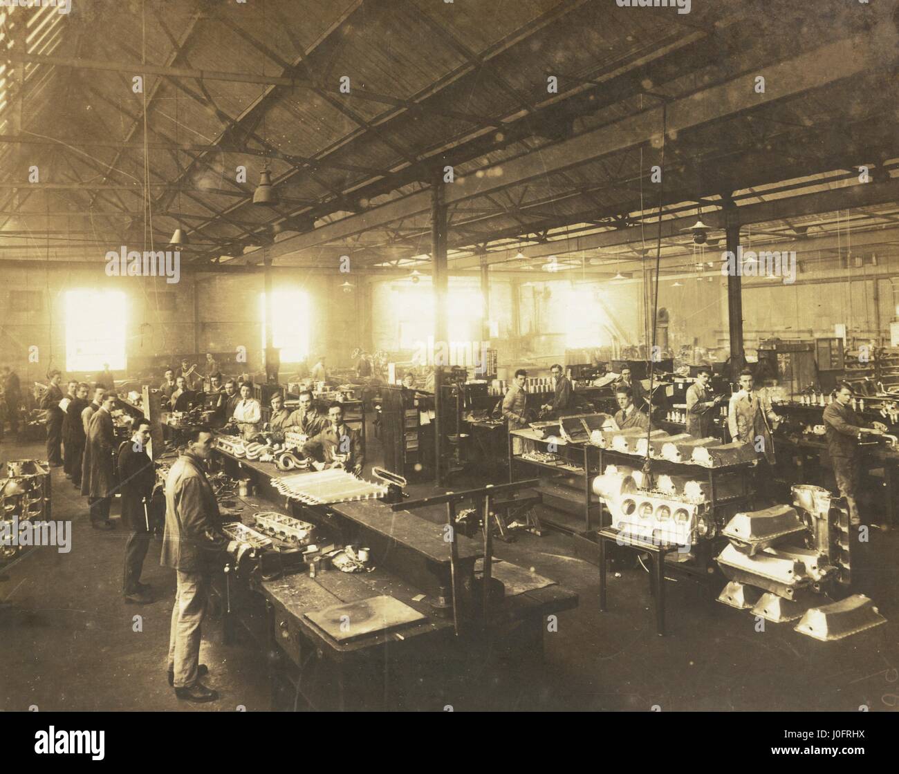 Workshop during the assembly of Lion engines Stock Photo - Alamy