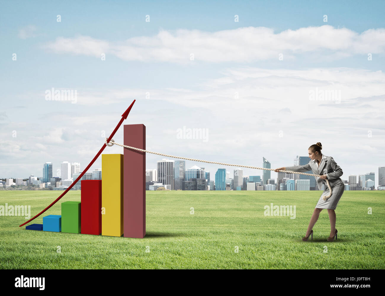 Businesswoman pulling graph with rope as concept of power and control ...