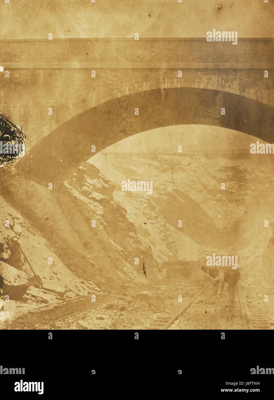 Railway scene, navvies working below a bridge or viaduct Stock Photo ...