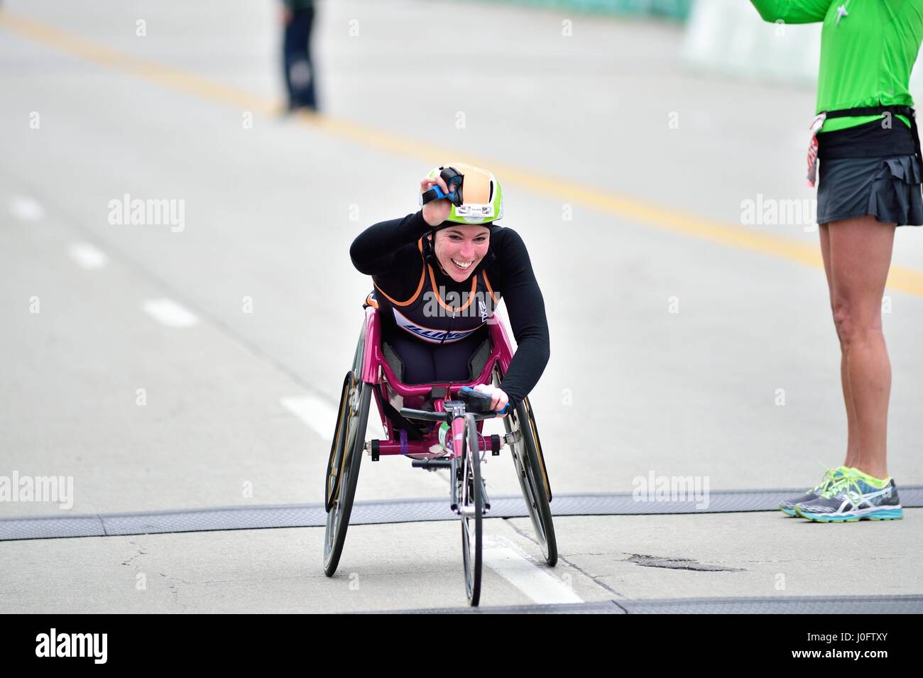 Amanda McGrory crossing the finish line as the overall winner of the ...