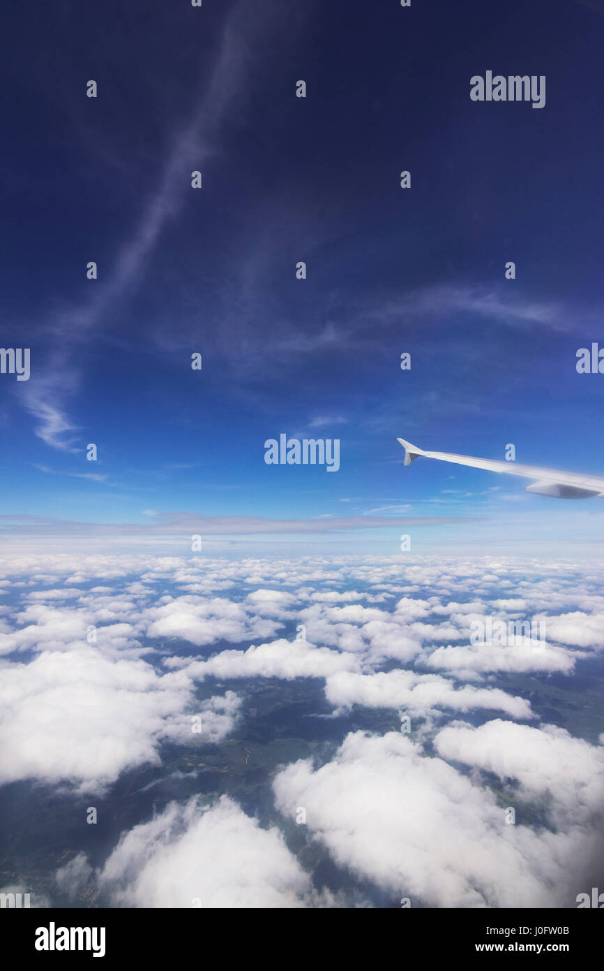 Looking out airplane window Stock Photo - Alamy