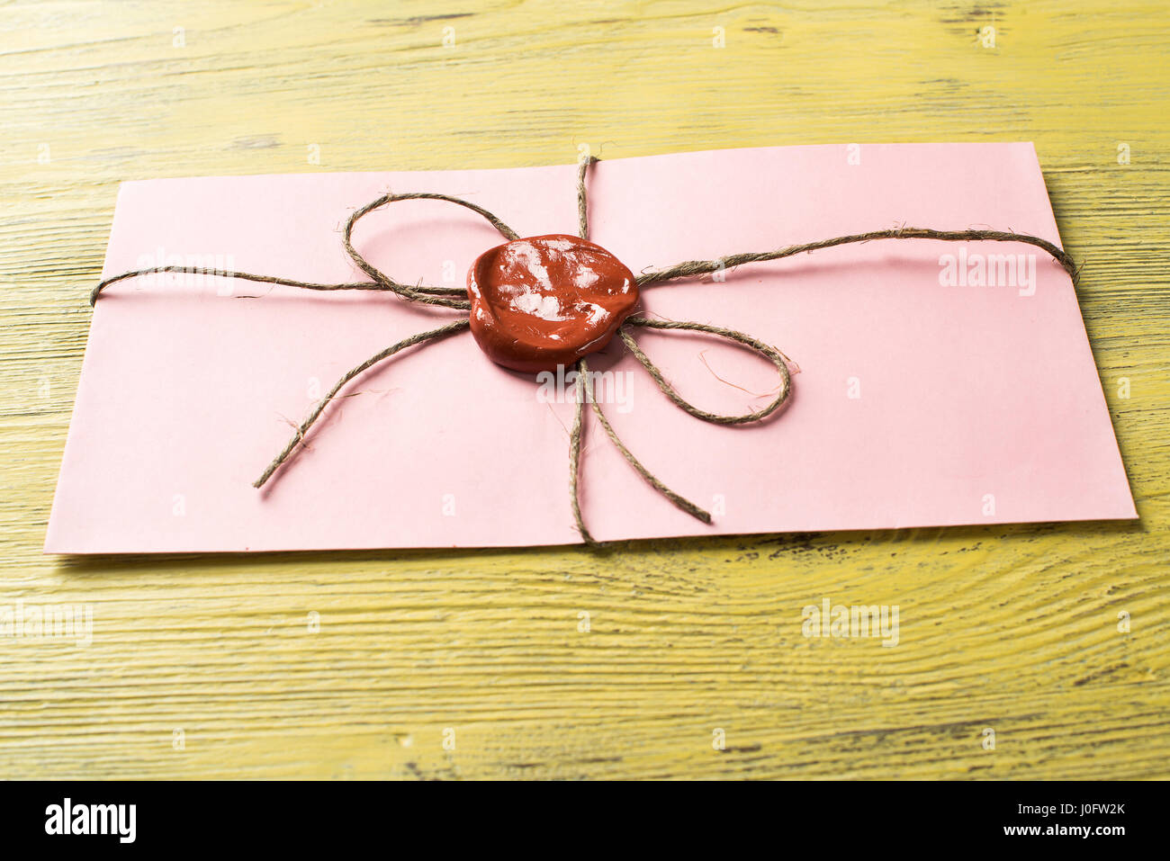 Letter with seal on table Stock Photo - Alamy