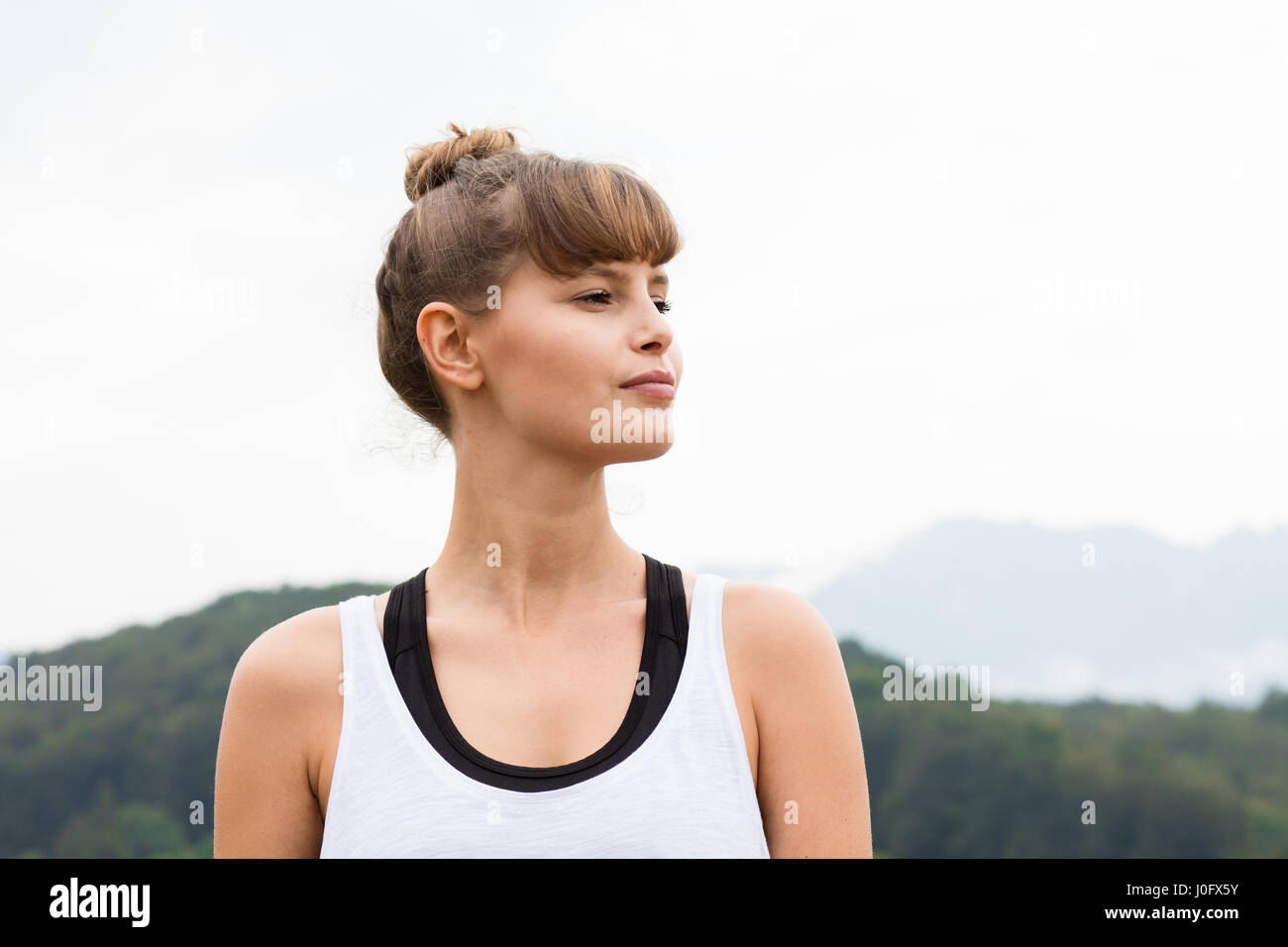 clouse up of a young woman outside in nature Stock Photo - Alamy